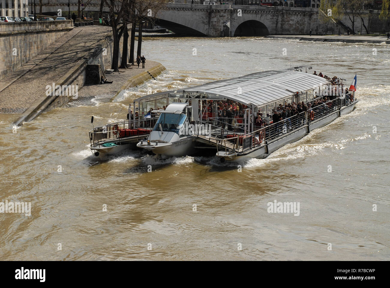 tourist barge on the Seine river in Paris Stock Photo - Alamy