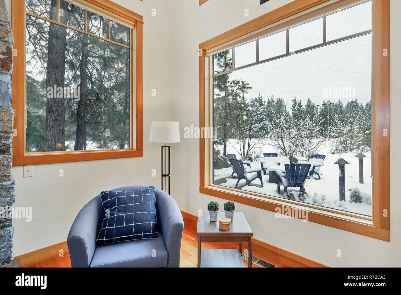Gorgeous window view of snowy patio from bright and spacious living ...