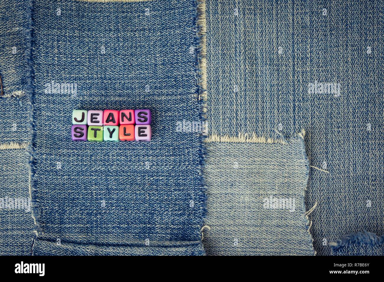 cubes with letters jeans style on a jeans background Stock Photo - Alamy