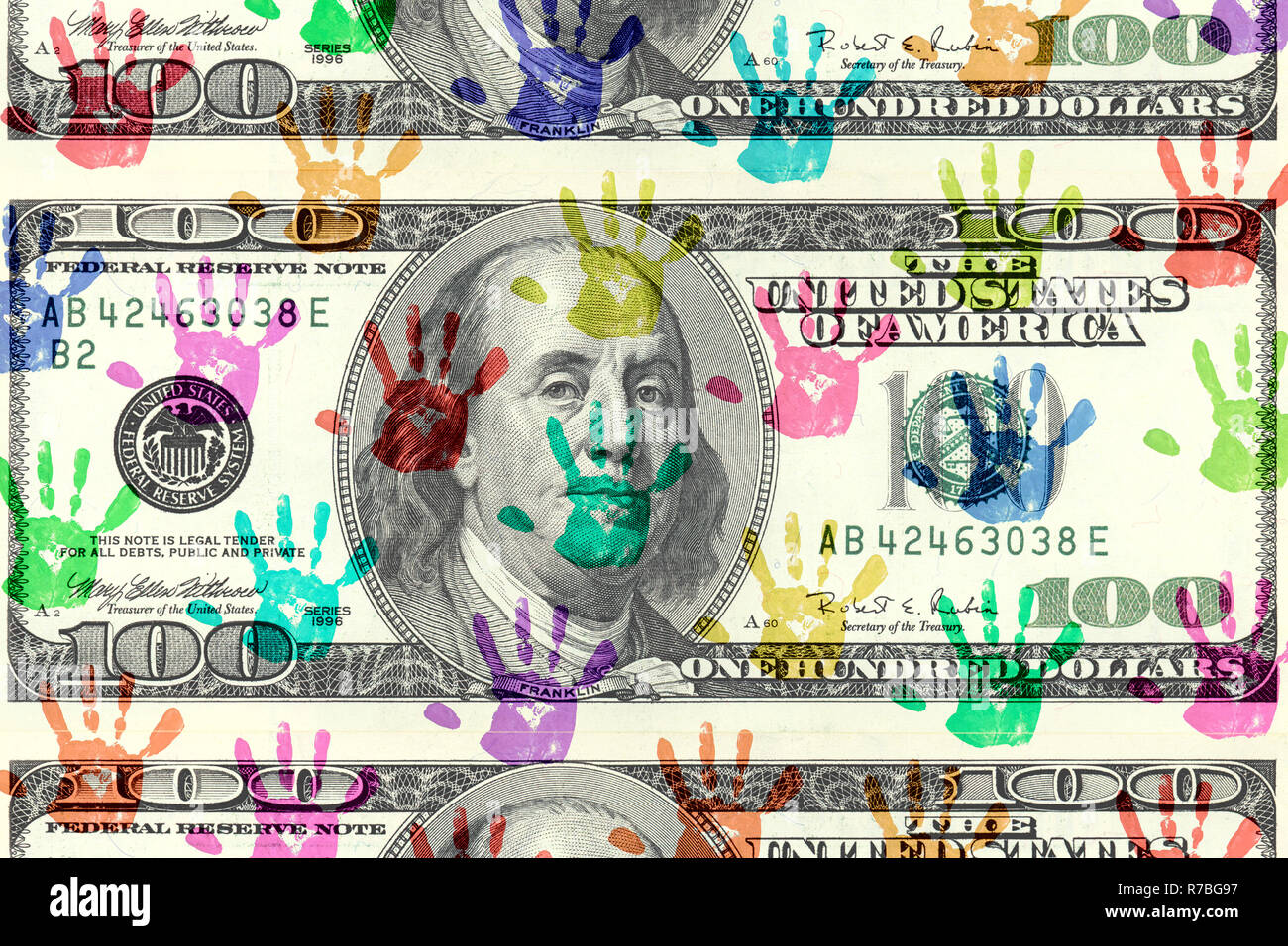 dollar bill and handprints Stock Photo - Alamy