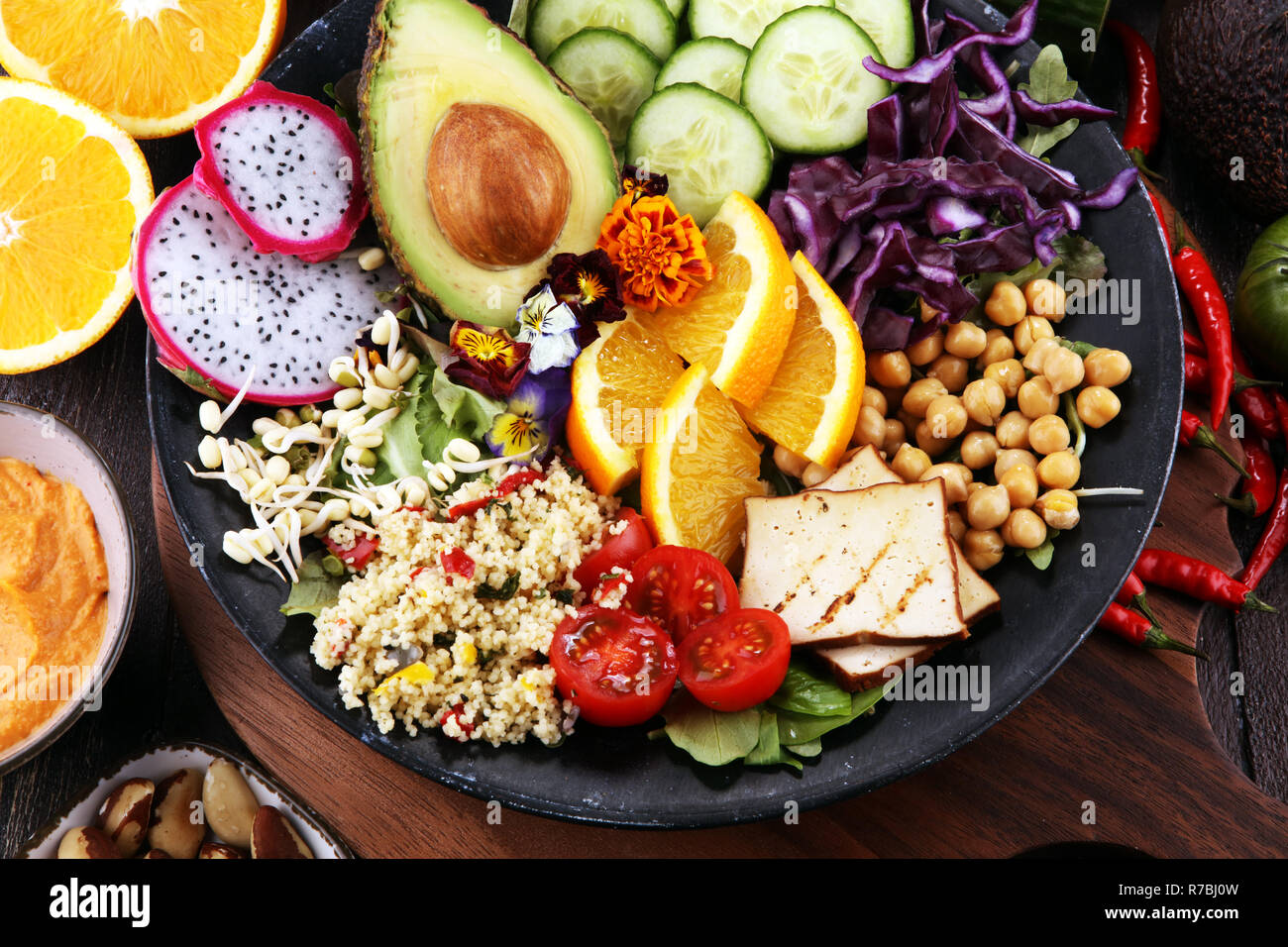 grilled tofu and dragon fruit buddha bowl with vegetable and humus ...