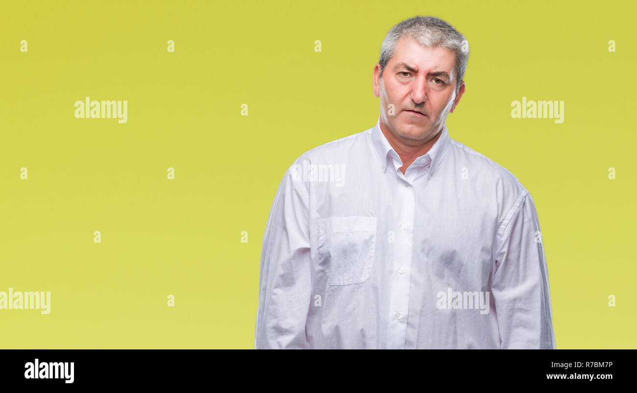 Handsome senior man over isolated background depressed and worry for ...