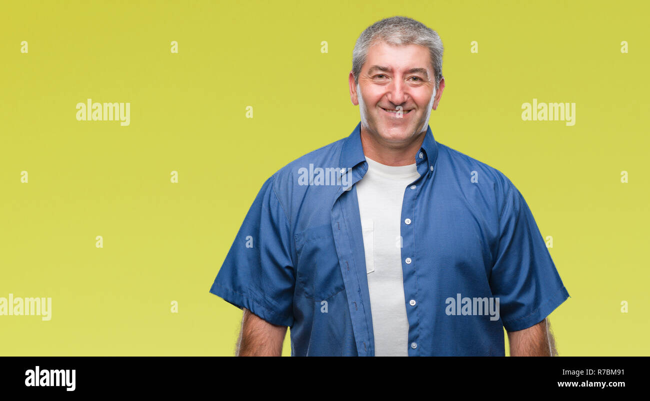 Handsome senior man over isolated background with a happy and cool ...