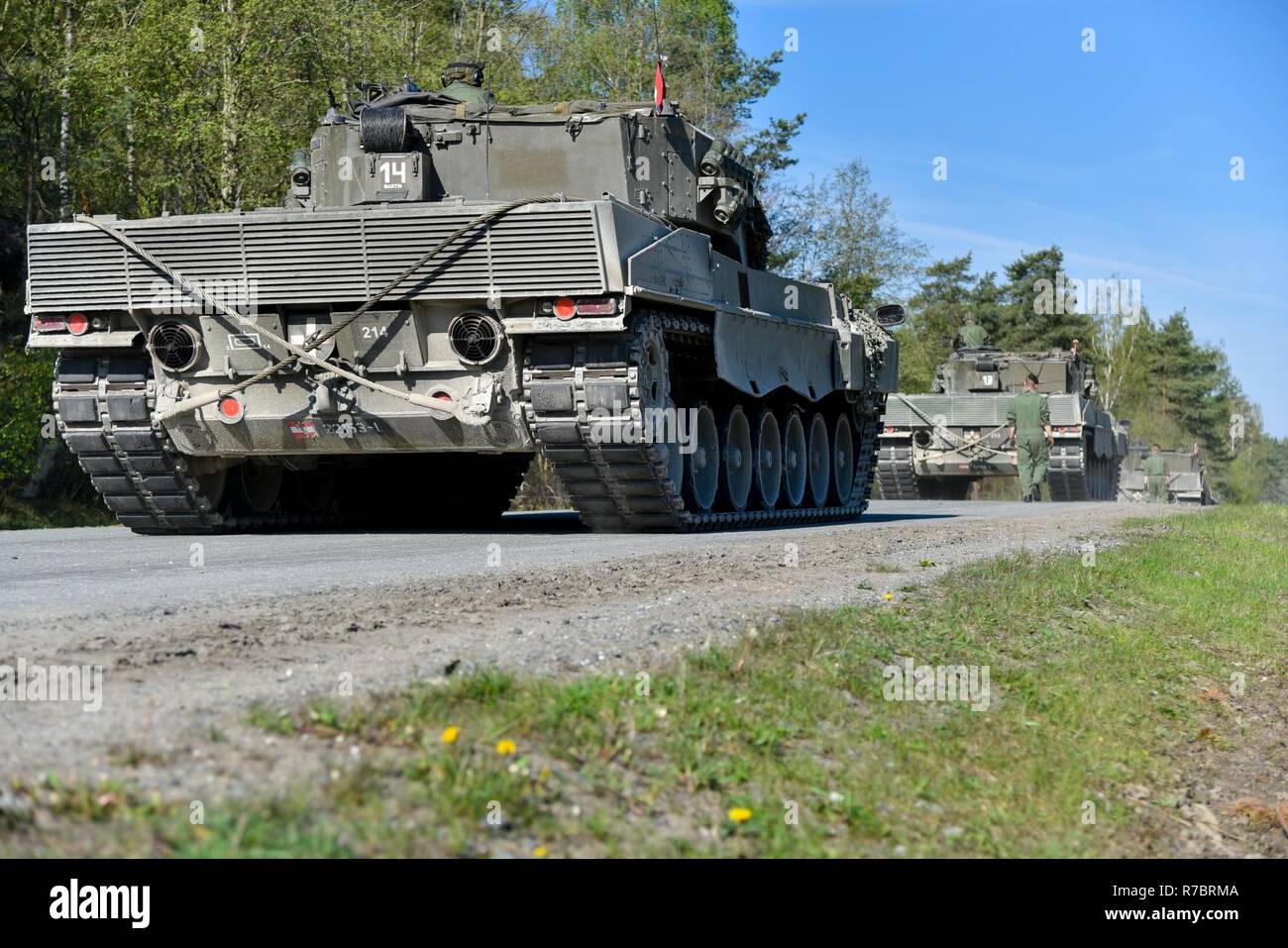 Team Austria maneuvers its Leopard 2A4 tanks to the start point for the ...