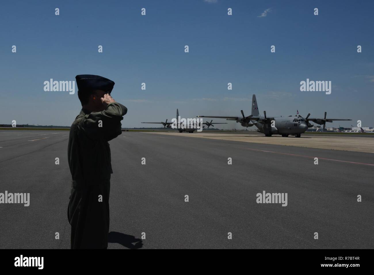U.S. Air Force Col. Joseph Stepp salutes two North Carolina Air ...