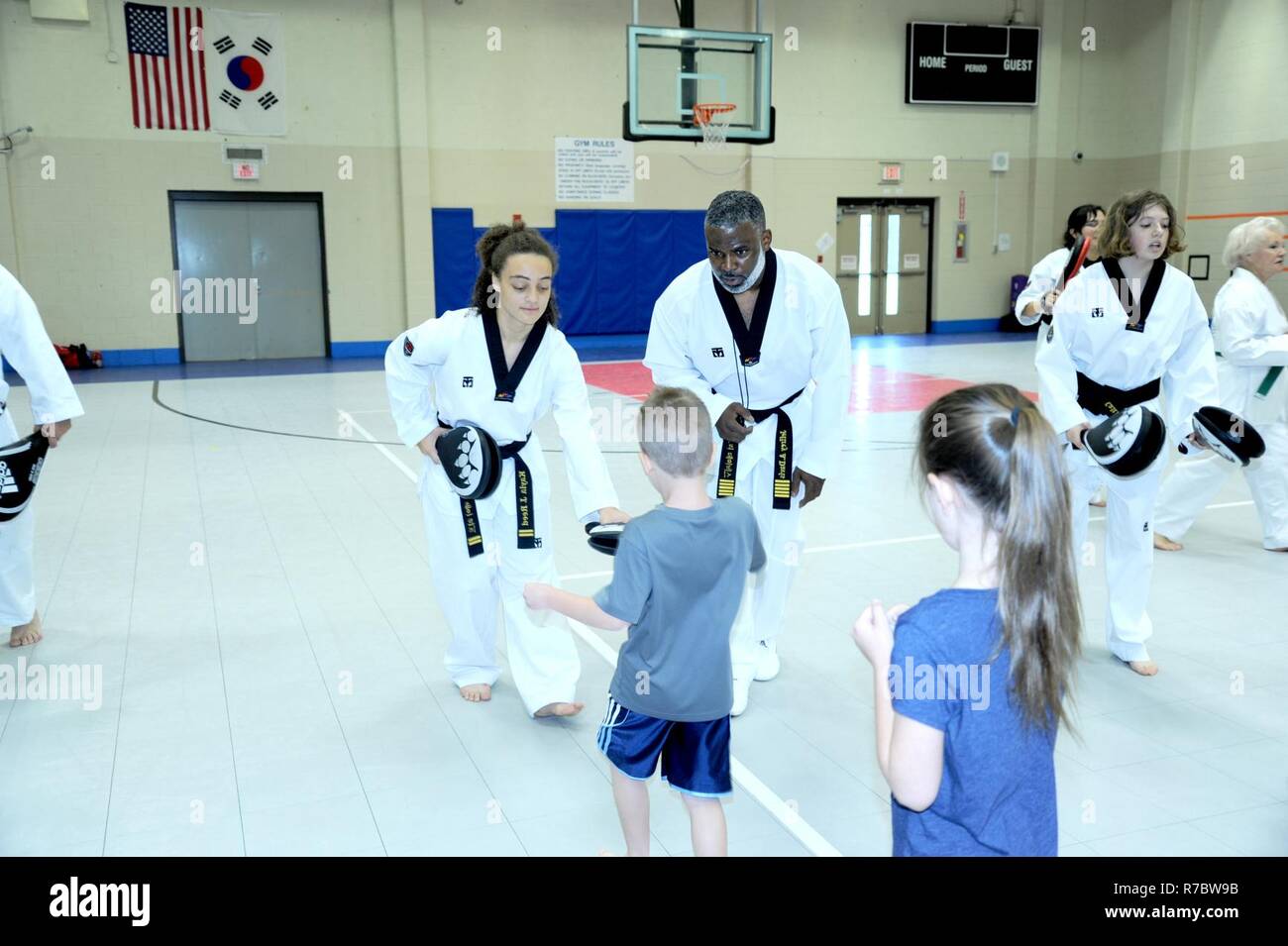 Jeffrey Davis, tae kwon do black belt master, and one of his black belt instructors, Kayla Reed ...