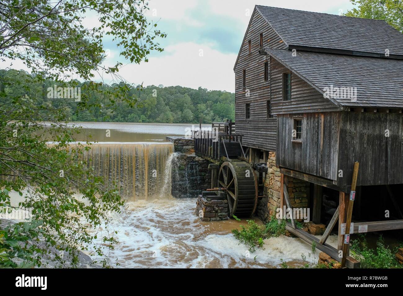 View of the old gristmill at Historic Yates Mill County Park during ...