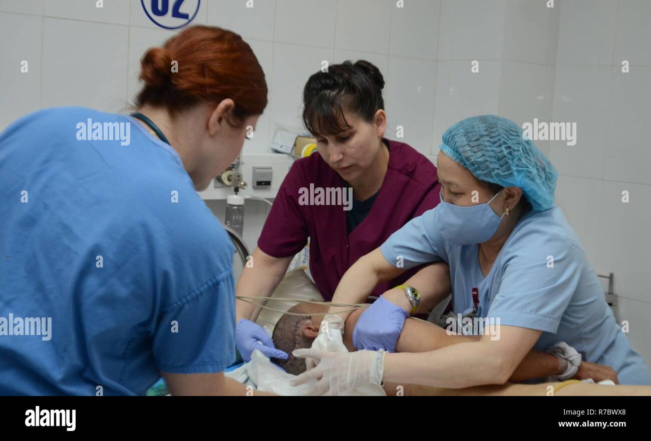 DA NANG, Vietnam (May 15, 2017) Lt. Cmdr. Susan Pickman assists local ...