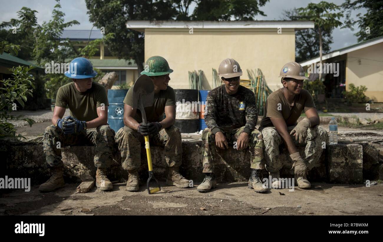 Philippine Army and U.S. Marine engineers take a break during an ...