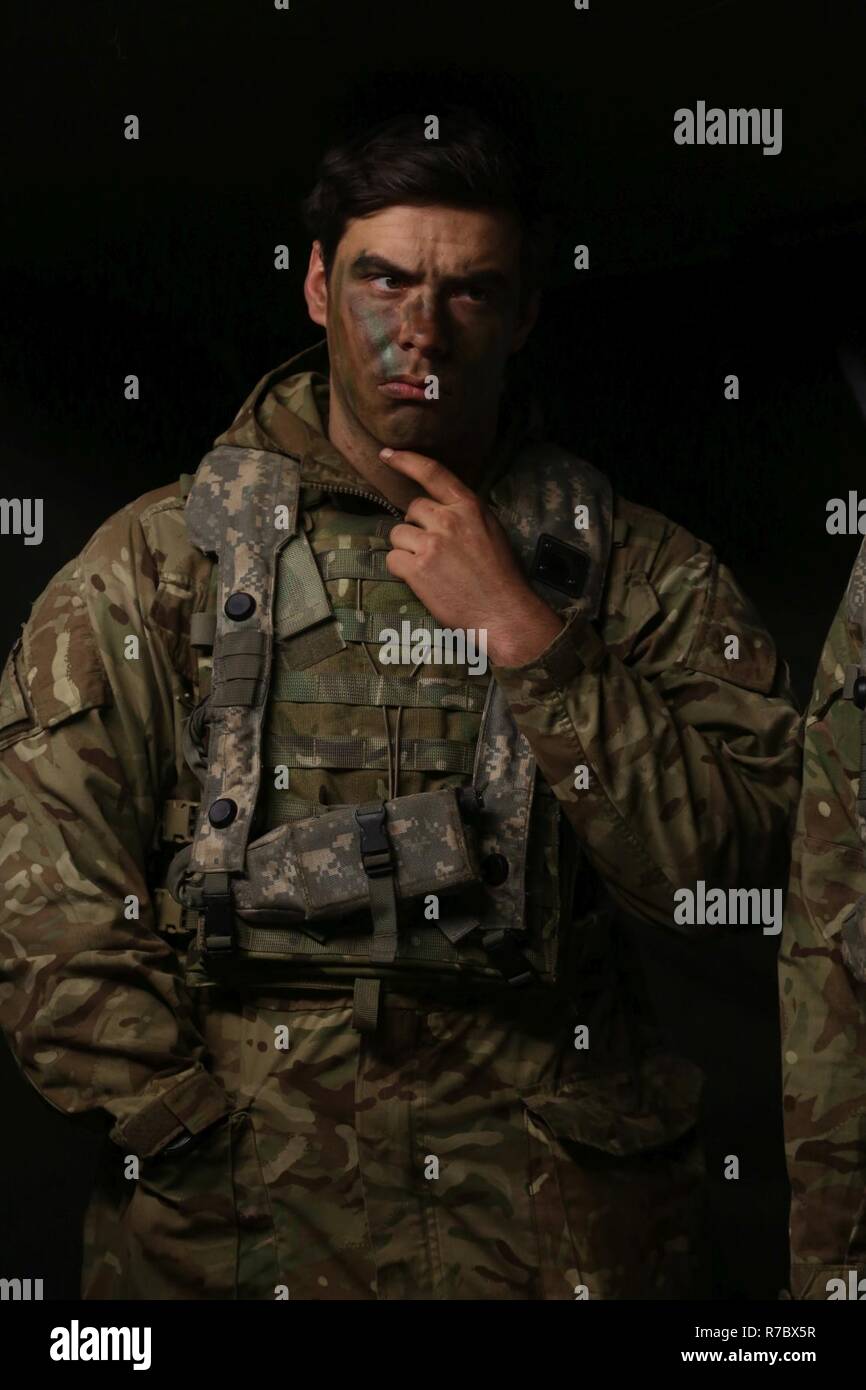 A British soldier of the Queens Royal Hussars receives operational ...
