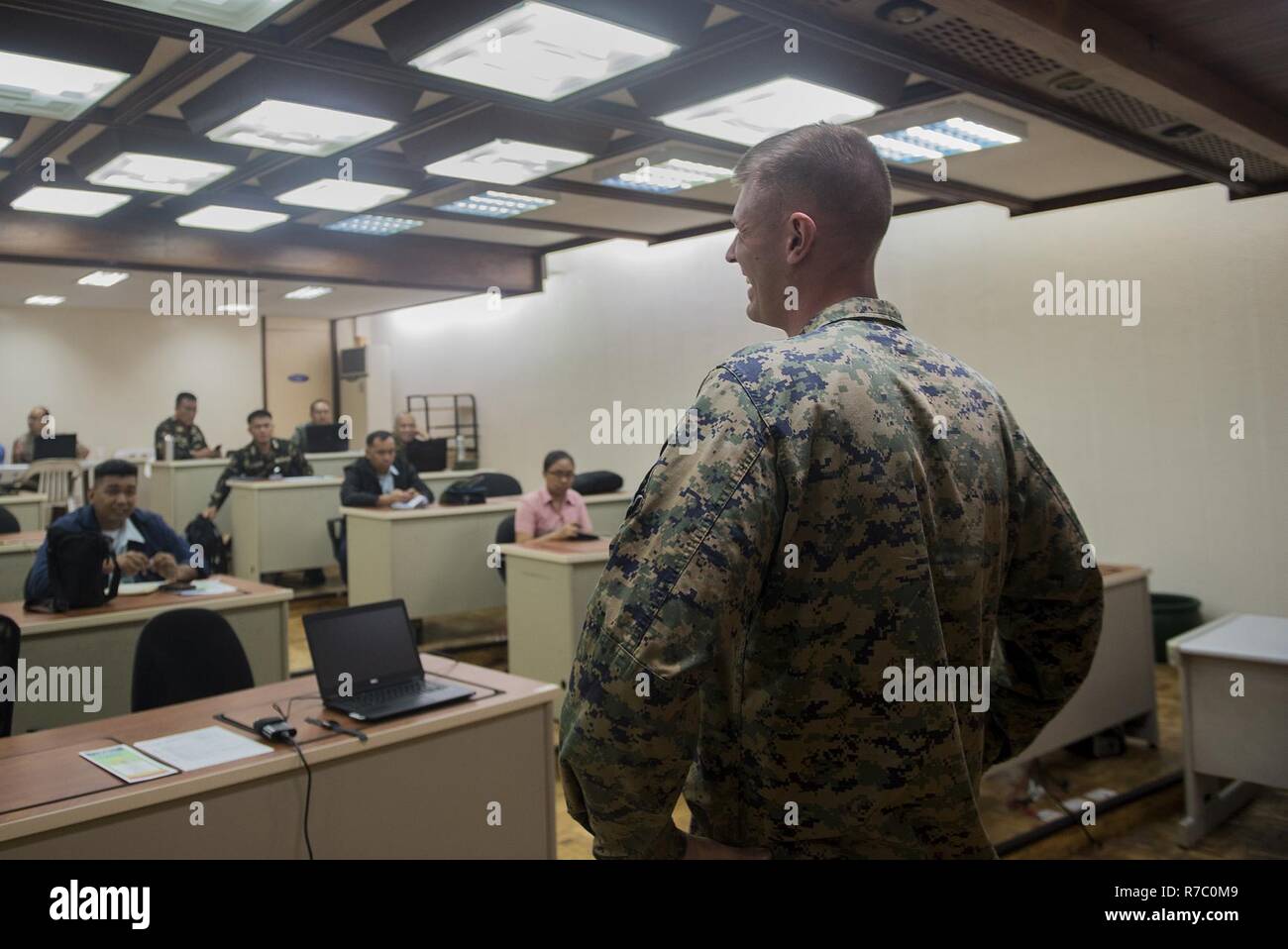 Members of the Armed Forces of the Philippines attend a briefing on ...