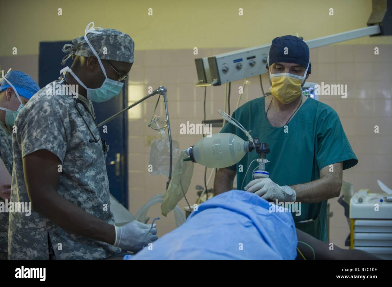 U.S. Army Reserve Maj. Christopher Sims, a nurse anesthetist, and his ...