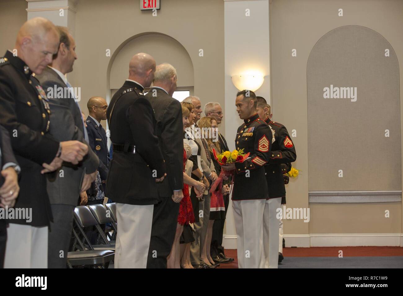 U.S. Marines present Mrs. Christine Coetzee, wife of U.S. Marine Corps ...