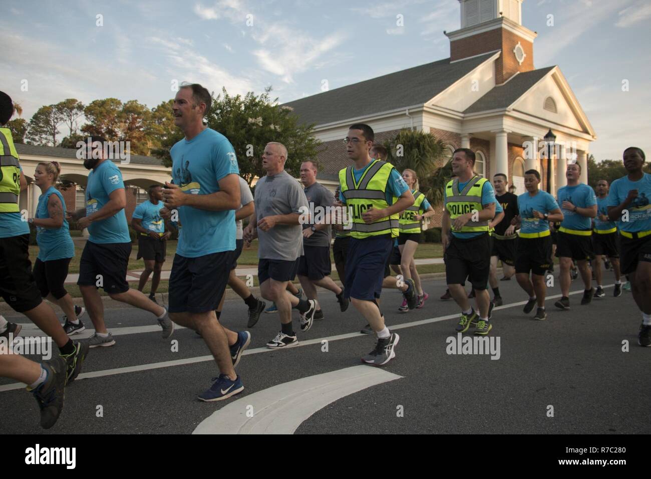 Local law enforcement of Hinesville, Ga. run alongside military police ...