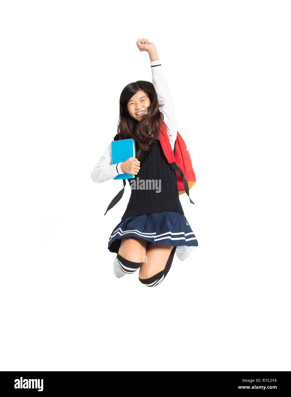 happy teenager student girl jumping Stock Photo - Alamy