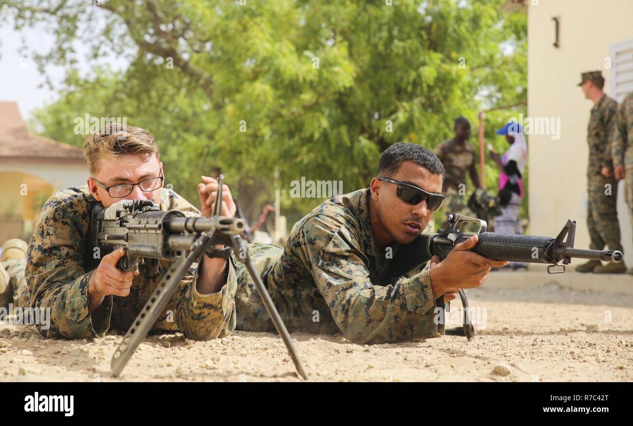 Cpl. Reno Schwind and Lance Cpl. Andrew Acosta, machine gunners with ...