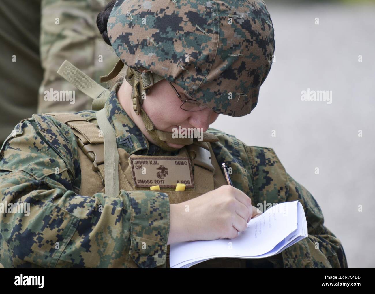 U.S. Marine Corps Cpl. Katelynn Jenks, combat marksmanship coach ...