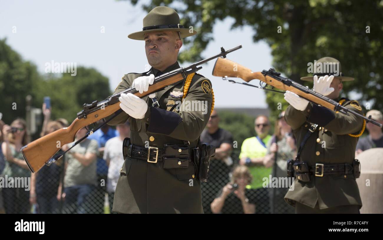 Members of the U.S. Border Patrol Honor Guard perform during the Steve ...