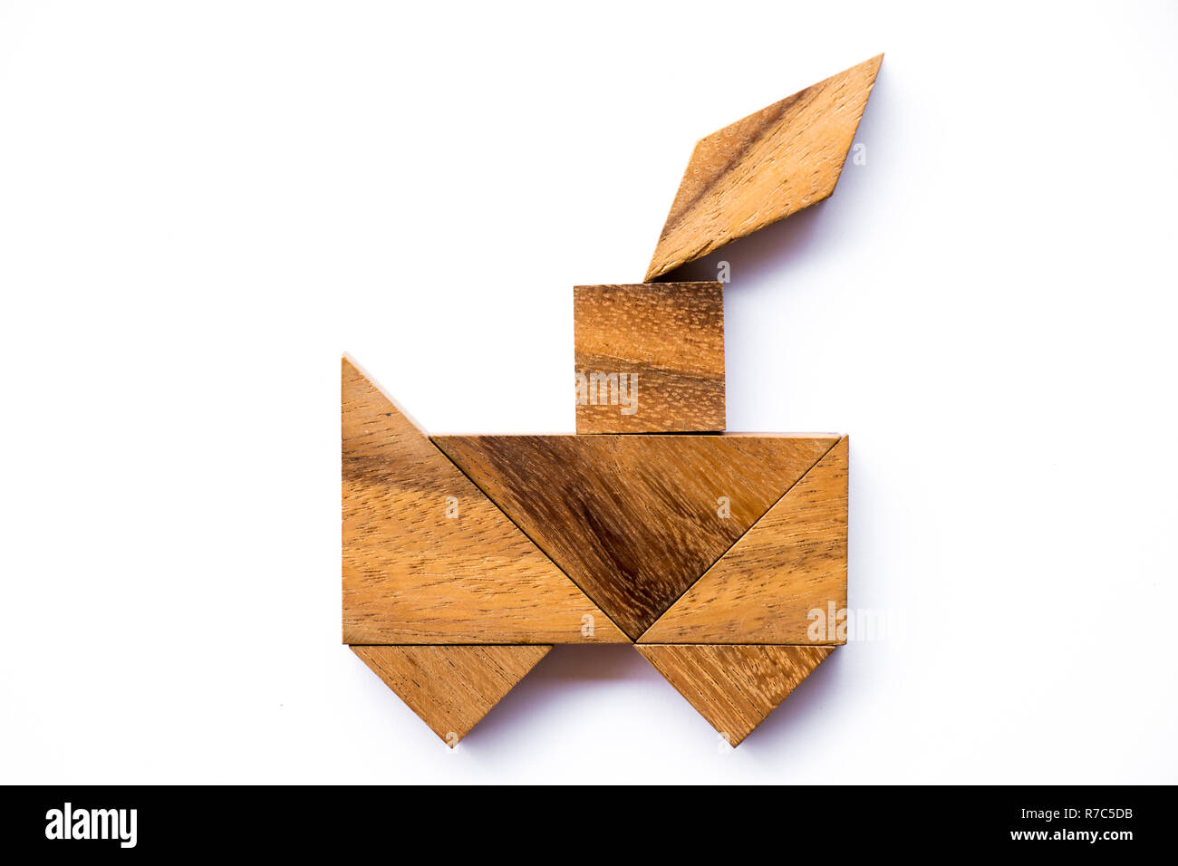 Wood tangram puzzle in train shape on white background Stock Photo - Alamy