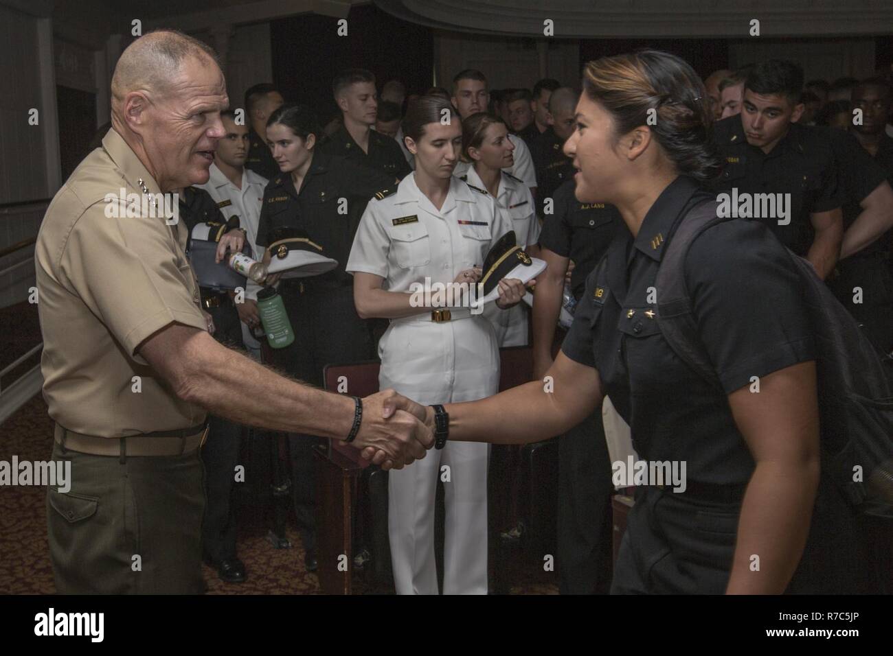 Commandant of the Marine Corps Gen. Robert B. Neller shakes hands with ...