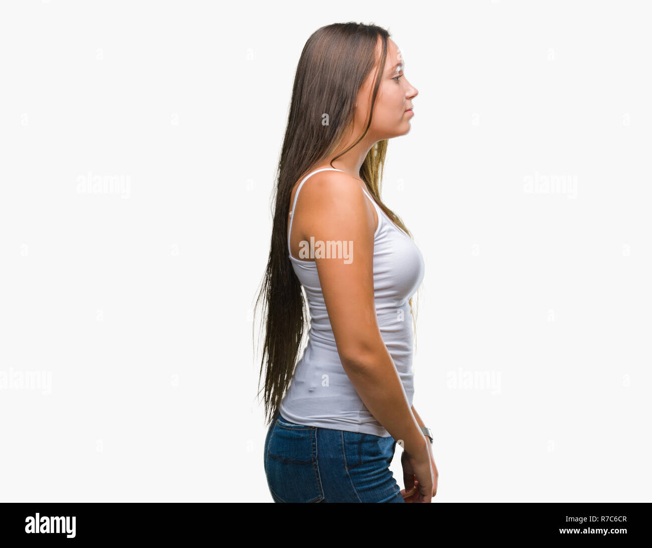 Young caucasian beautiful woman over isolated background looking to ...