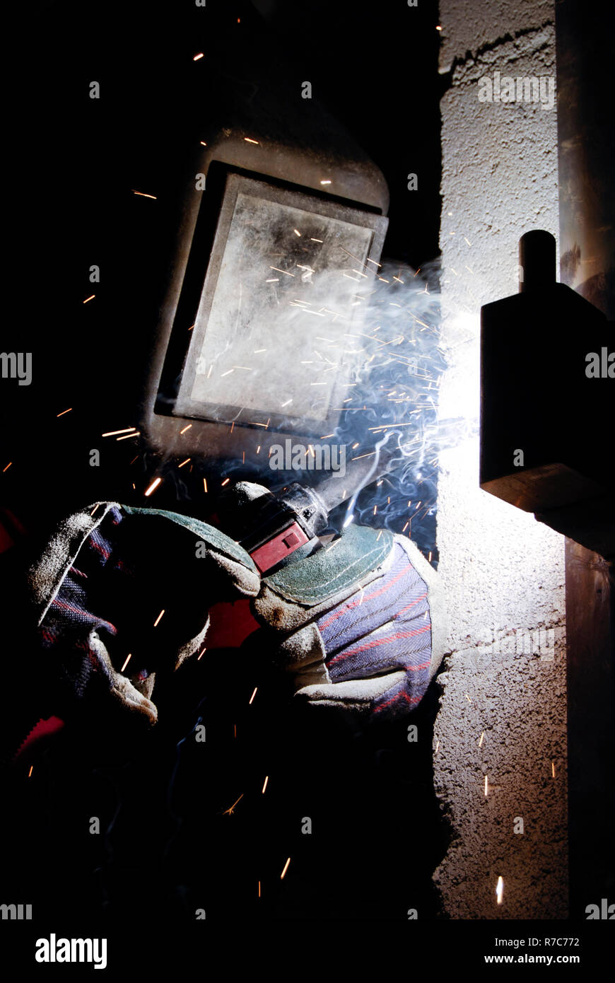 welder arc welding steel bracket Stock Photo - Alamy