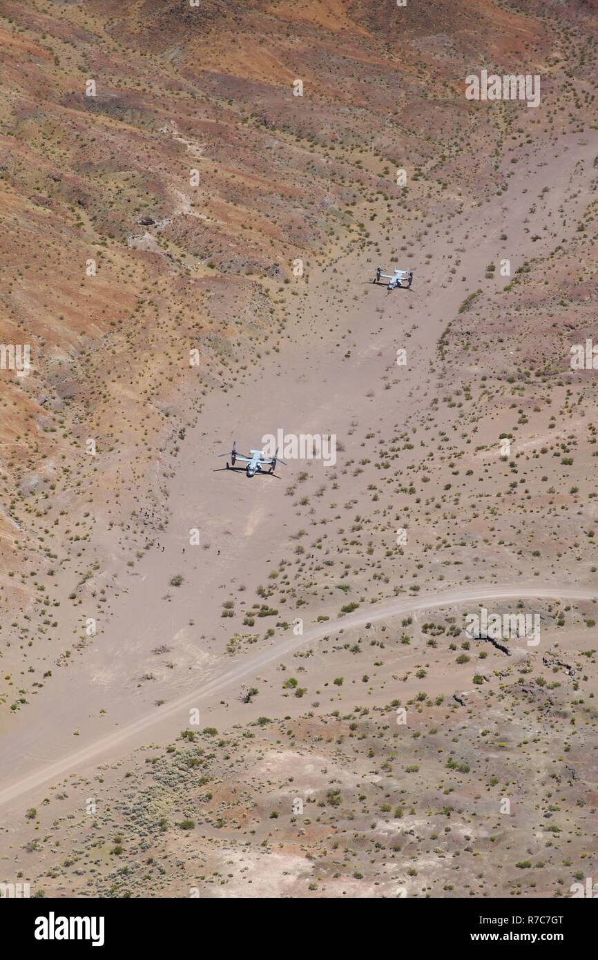 MV-22 Ospreys with Marine Medium Tiltrotor Squadron (VMM) 363 wait as ...