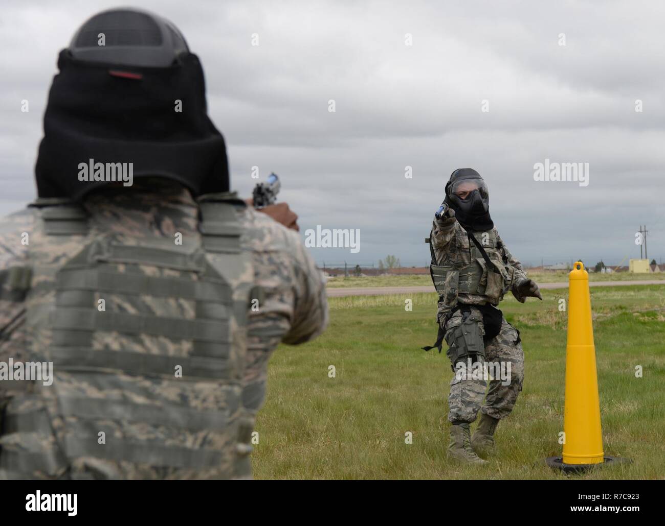 Airmen 1st Class Christopher Benson and Brenton White, response force ...