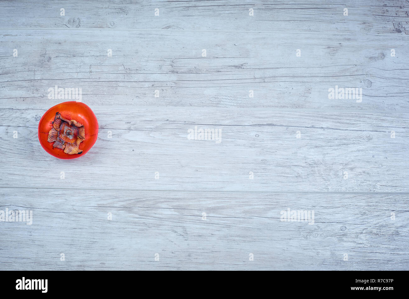 Mature fresh yellow persimmon hi-res stock photography and images - Alamy