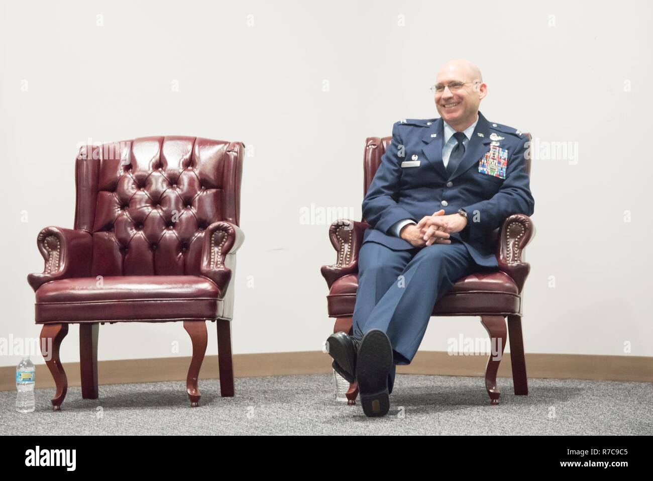 Col. Michael Manion listens to the officator speak during his ...