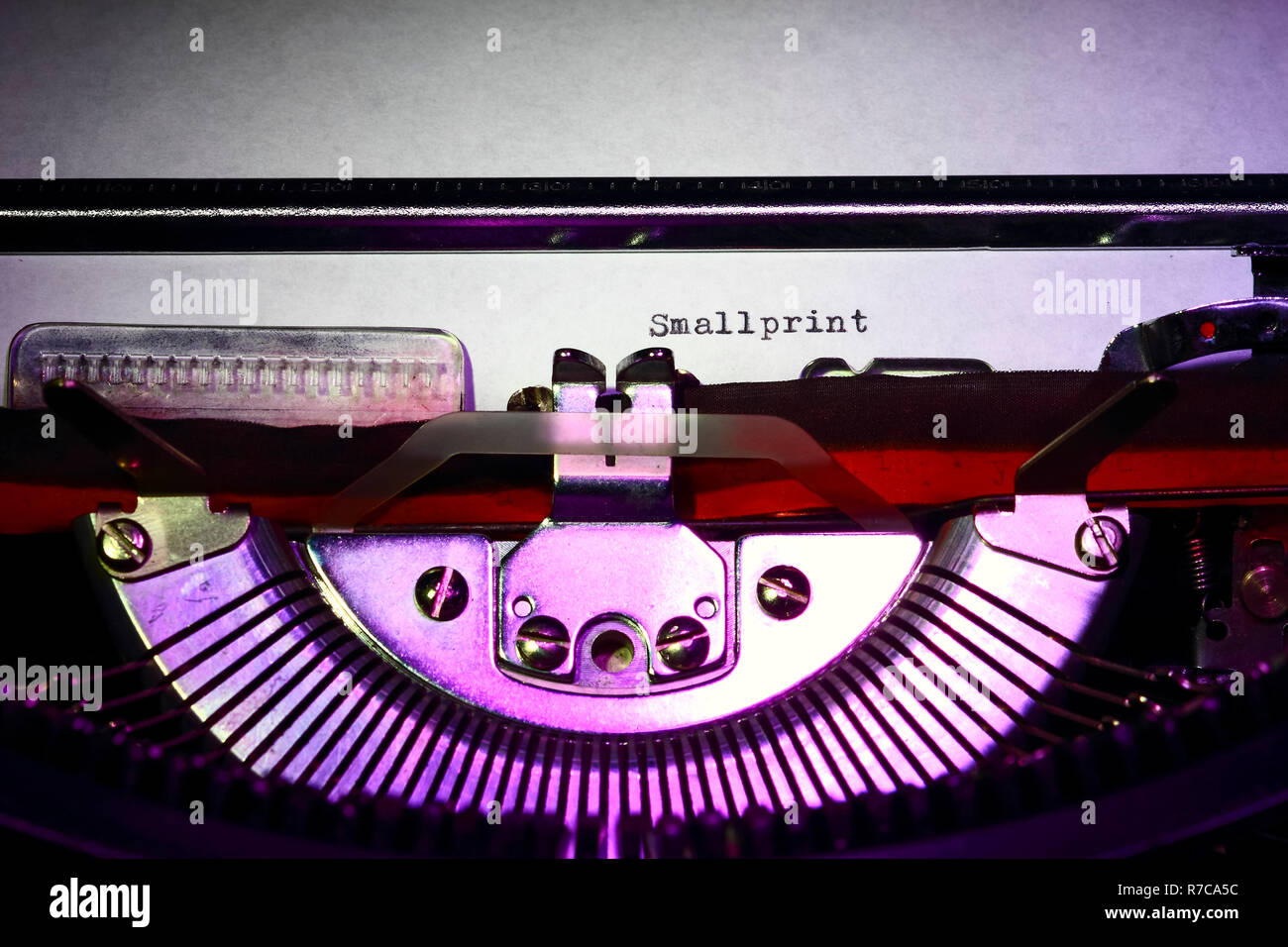 Vintage typewriter with the words small print printed on a letter Stock ...
