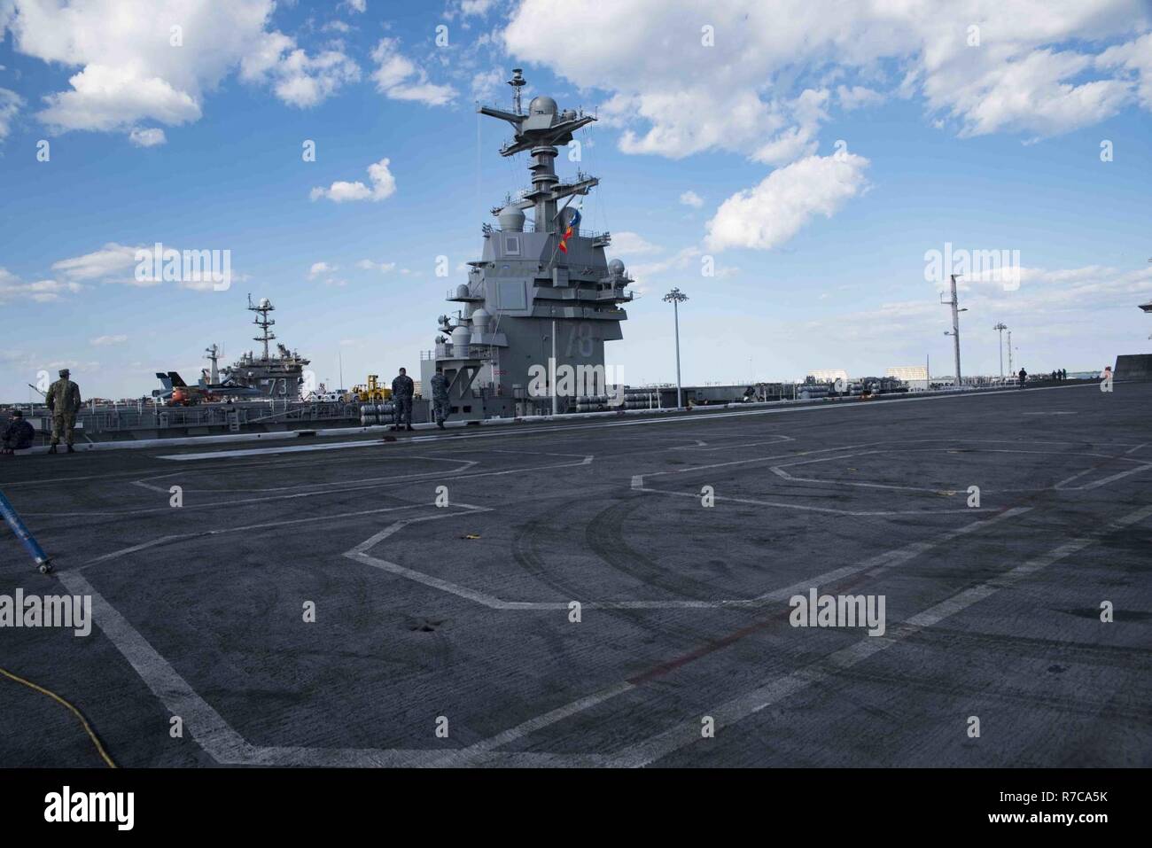 NORFOLK, Va. (May 8, 2017) Sailors watch as the aircraft carrier USS ...