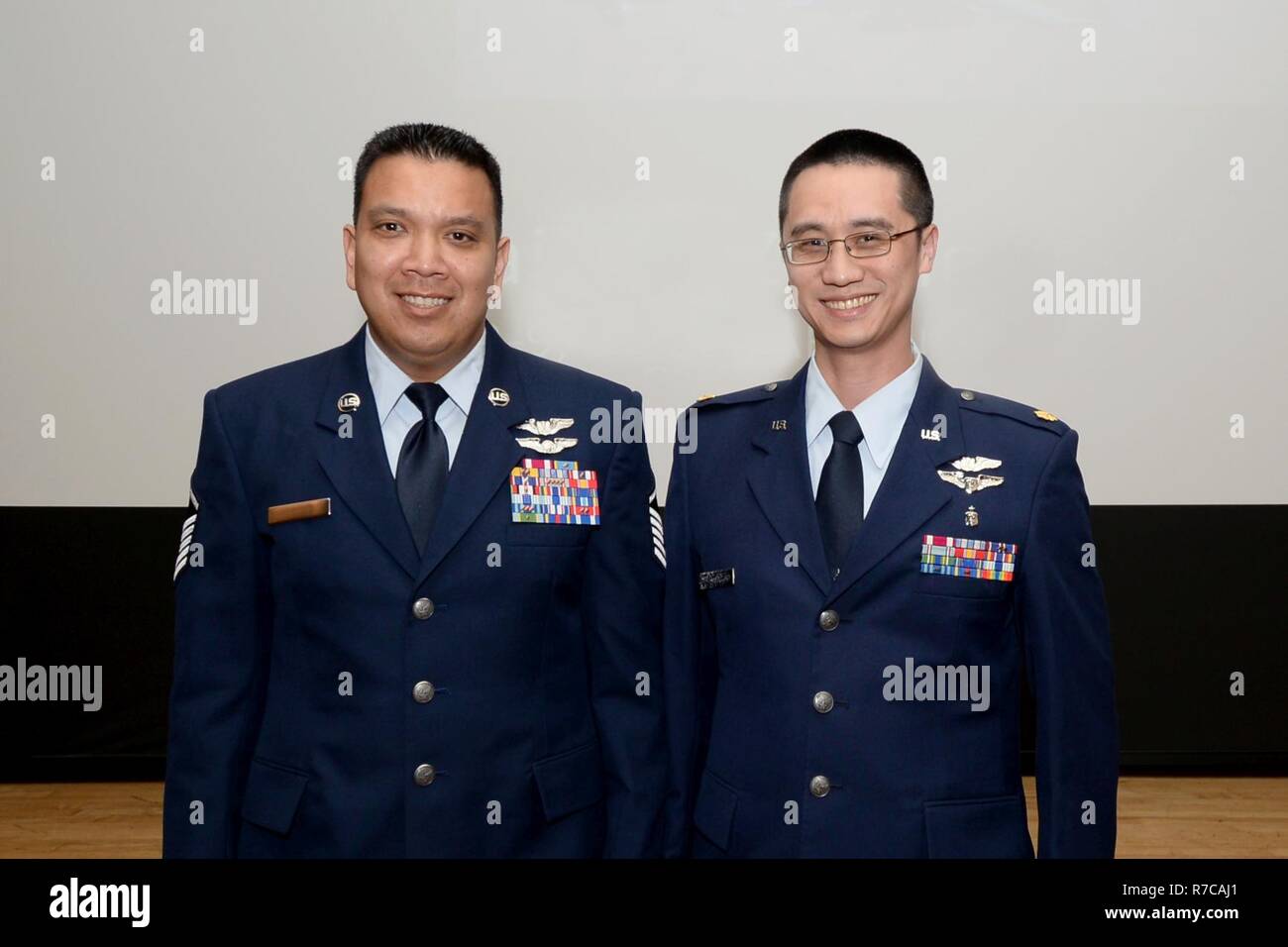 Master Sgt. Alex and Maj. Joe pose for a photo after Alex pinned on his ...