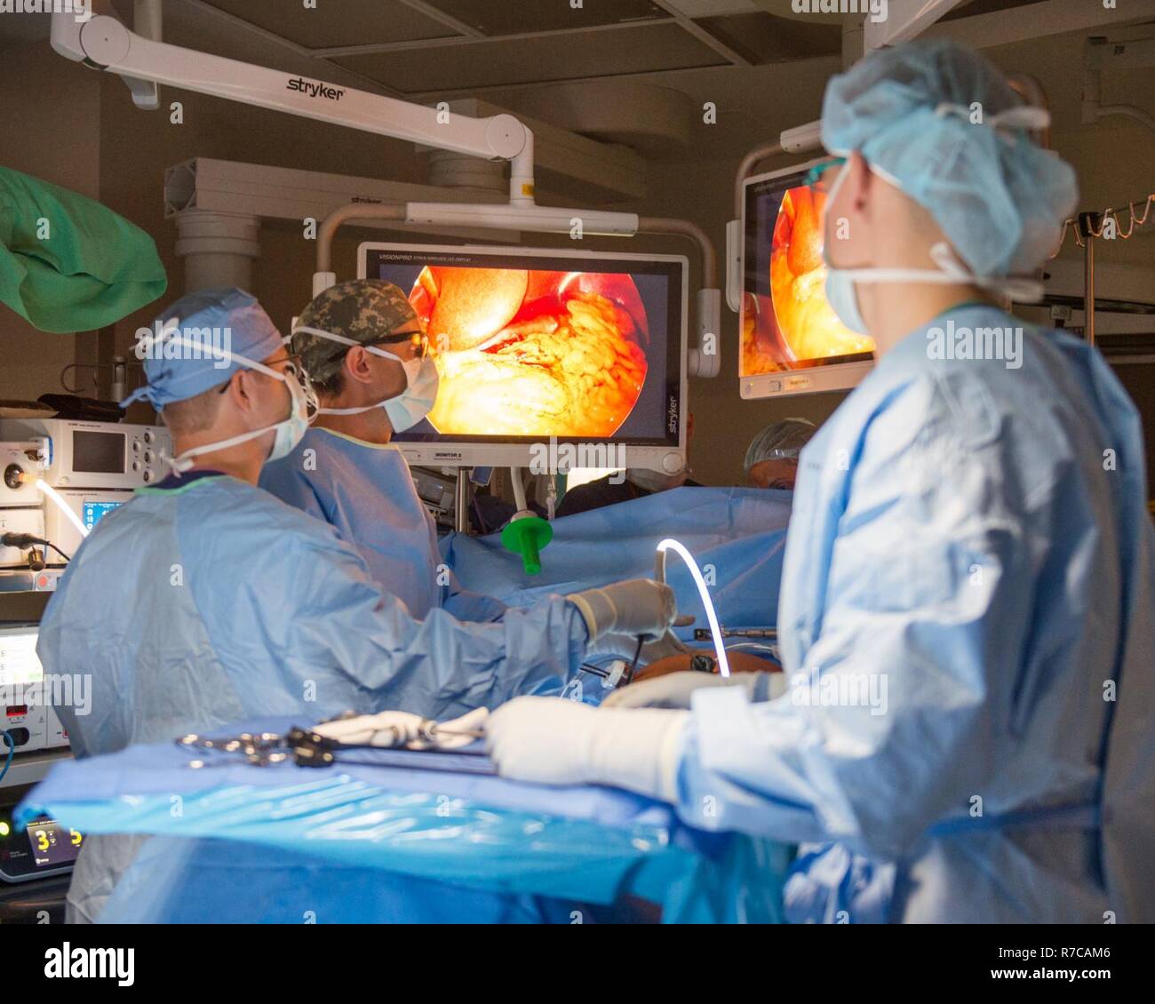 U.S. Air Force Maj. Michael Rawlins, back left, 60th Surgical ...