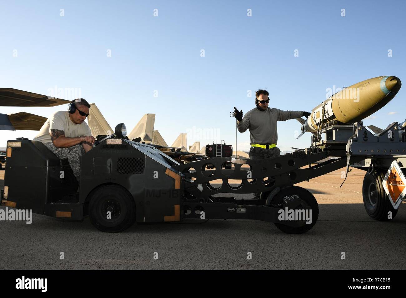 Weapons Airmen from the Hawaii Air National Guard prepare munitions for ...