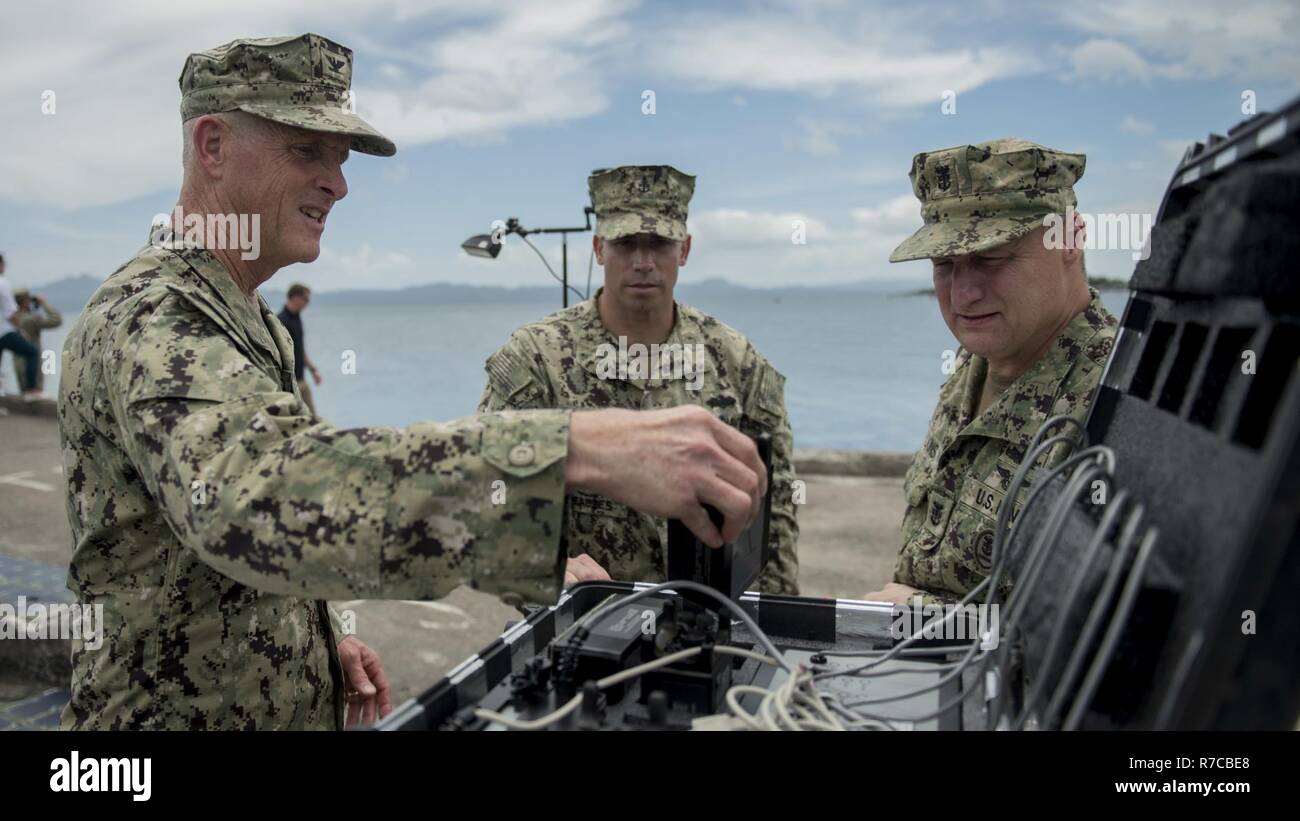 U.S. Navy Capt. Robert Baughman, left, Senior Chief Petty Officer ...
