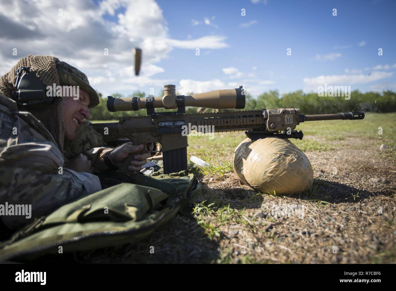 A U.S. Soldier fires his weapons during ballistics training with ...