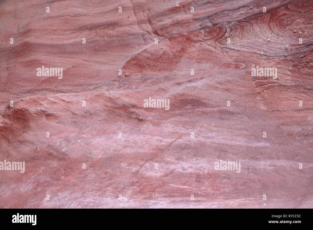 Texture of red sandstone. Background from the structure of mountains in ...