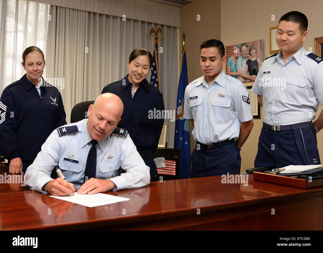 Col. Roman L. Hund, installation commander, signs a proclamation ...