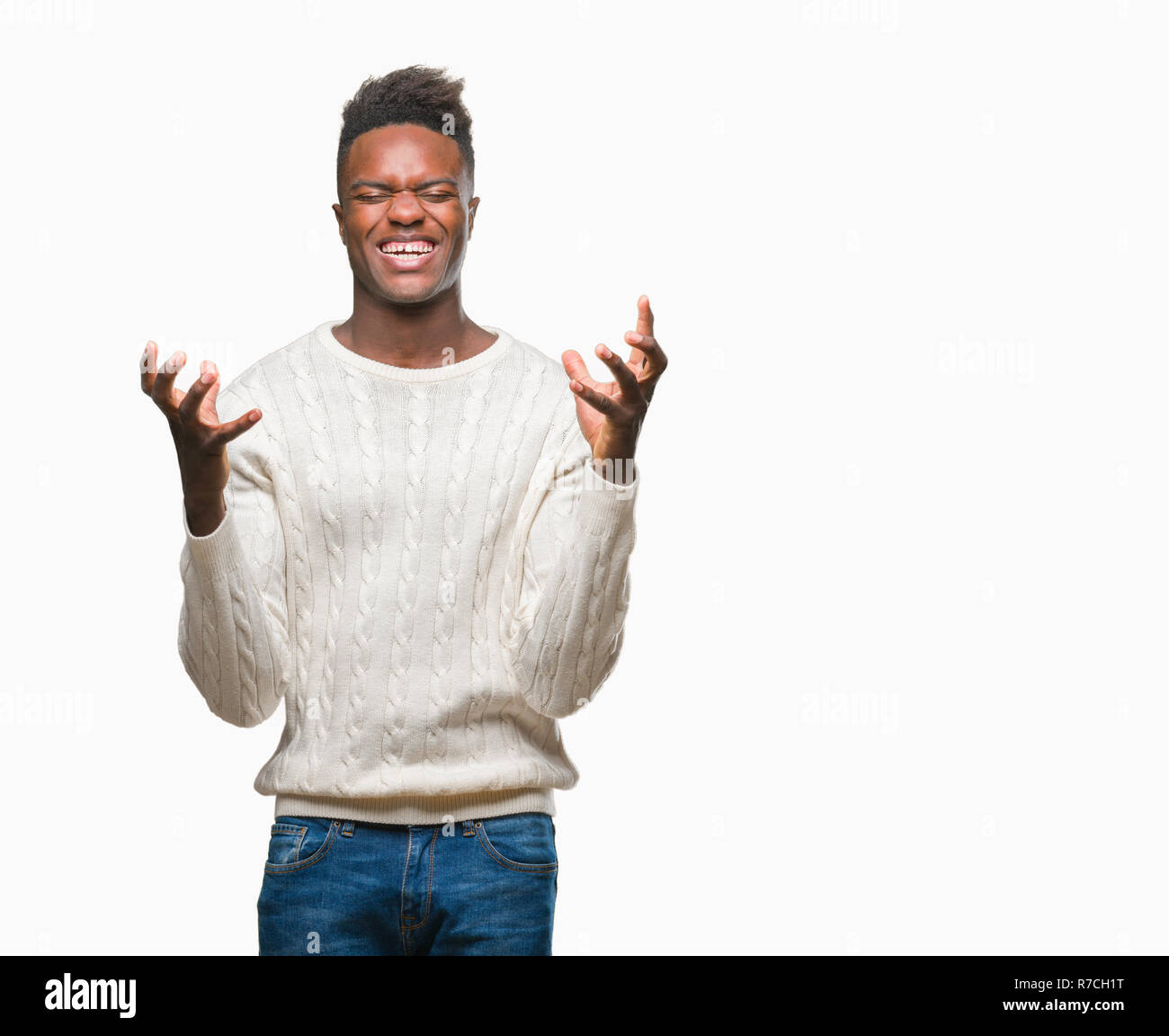 Young african american man over isolated background celebrating mad and ...