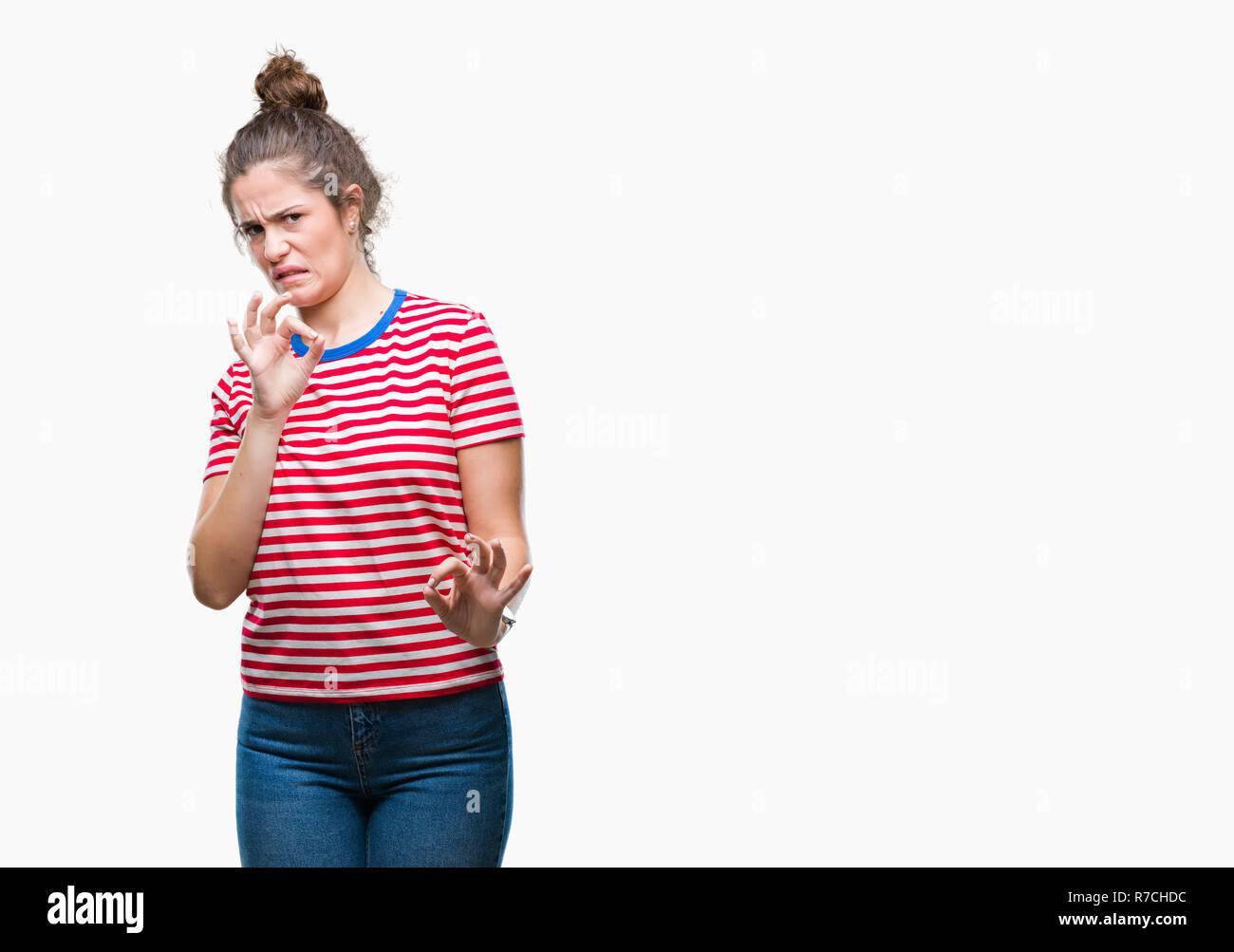 Beautiful brunette curly hair young girl wearing casual look over ...