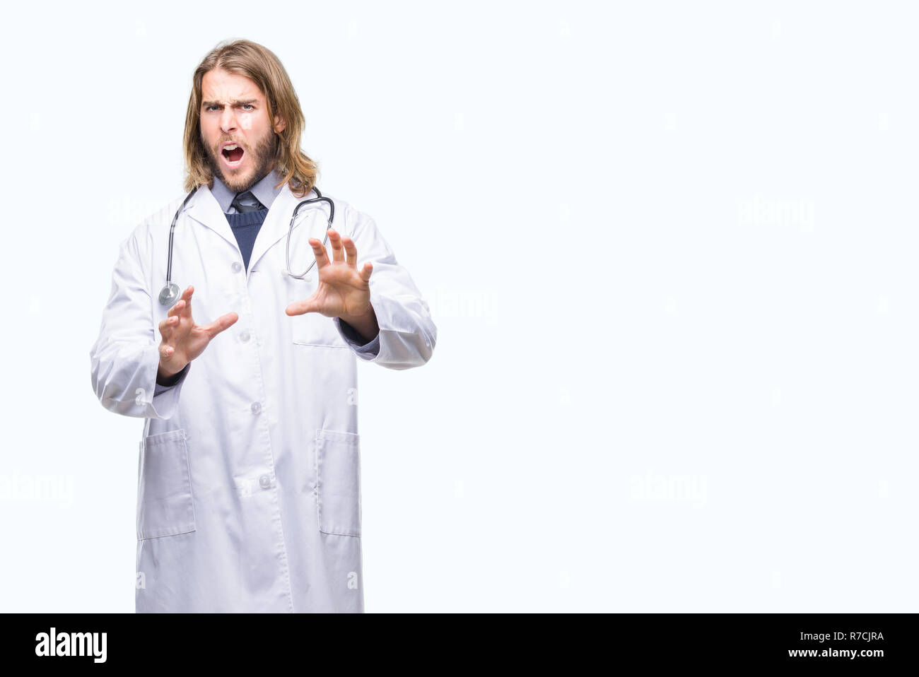 Young handsome doctor man with long hair over isolated background ...