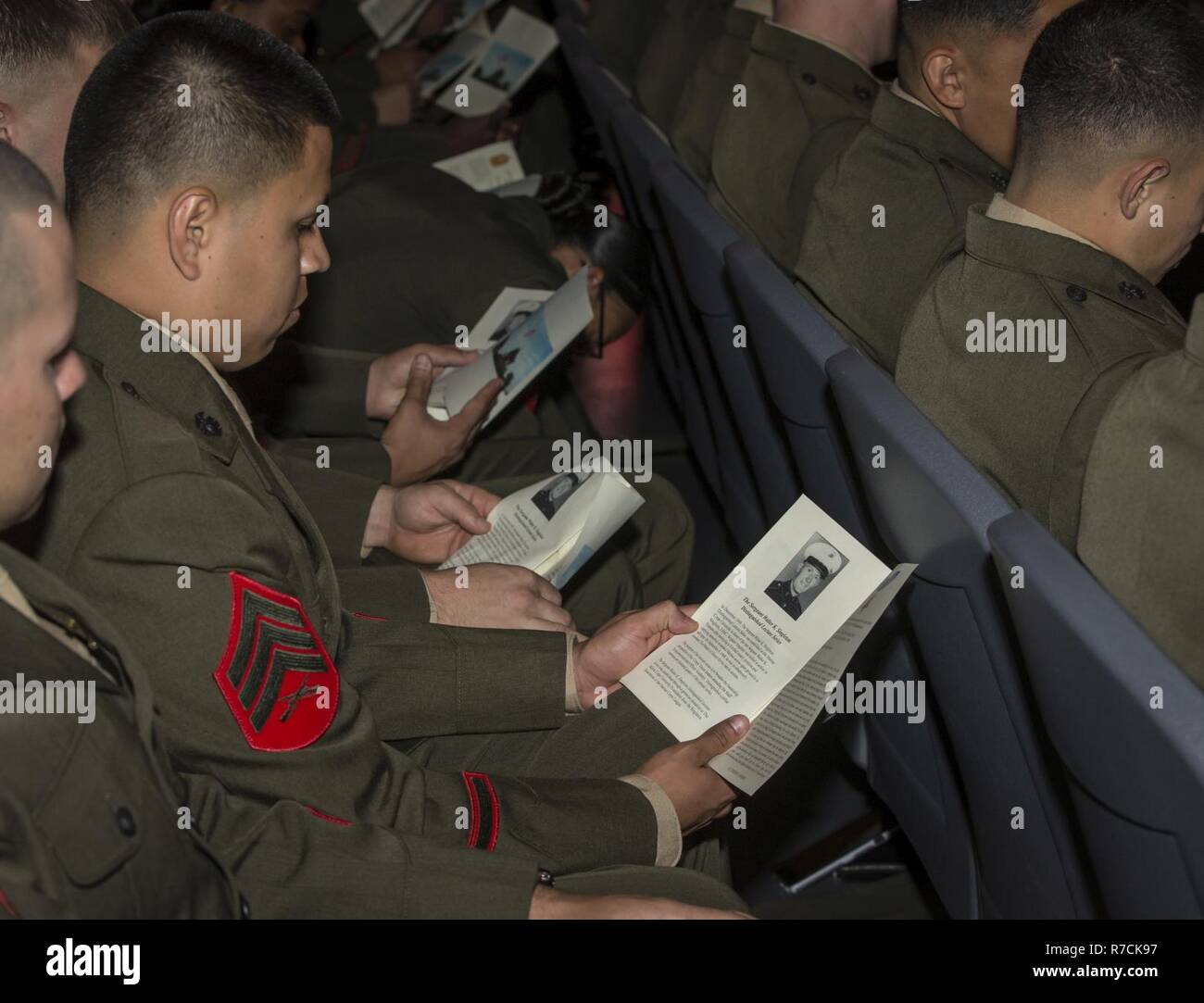 U.S. Marines look at their pamphlets during the 17th Sgt. Walter K ...