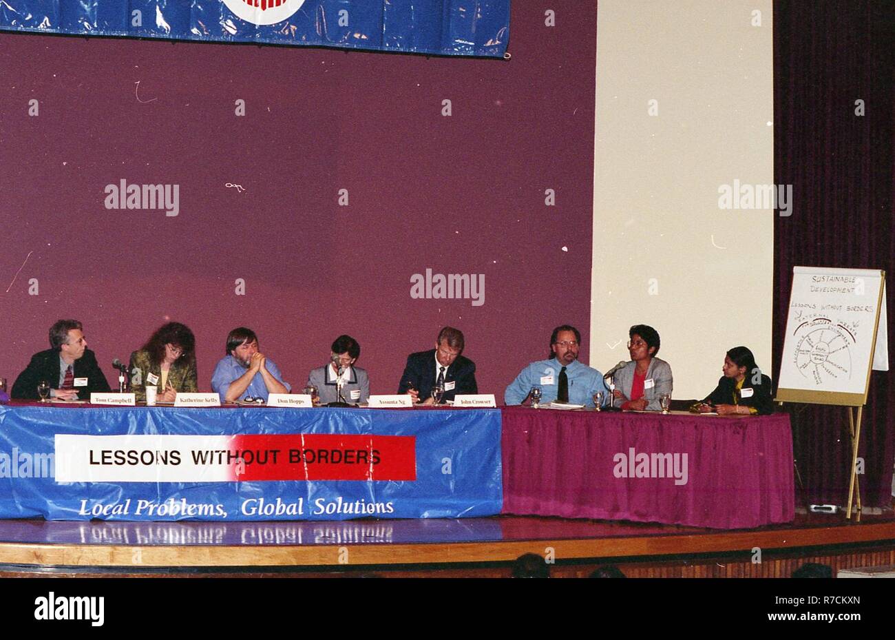 A GROUP OF MEN AND WOMEN ON STAGE AT THE LESSONS WITHOUT BORDERS Stock ...