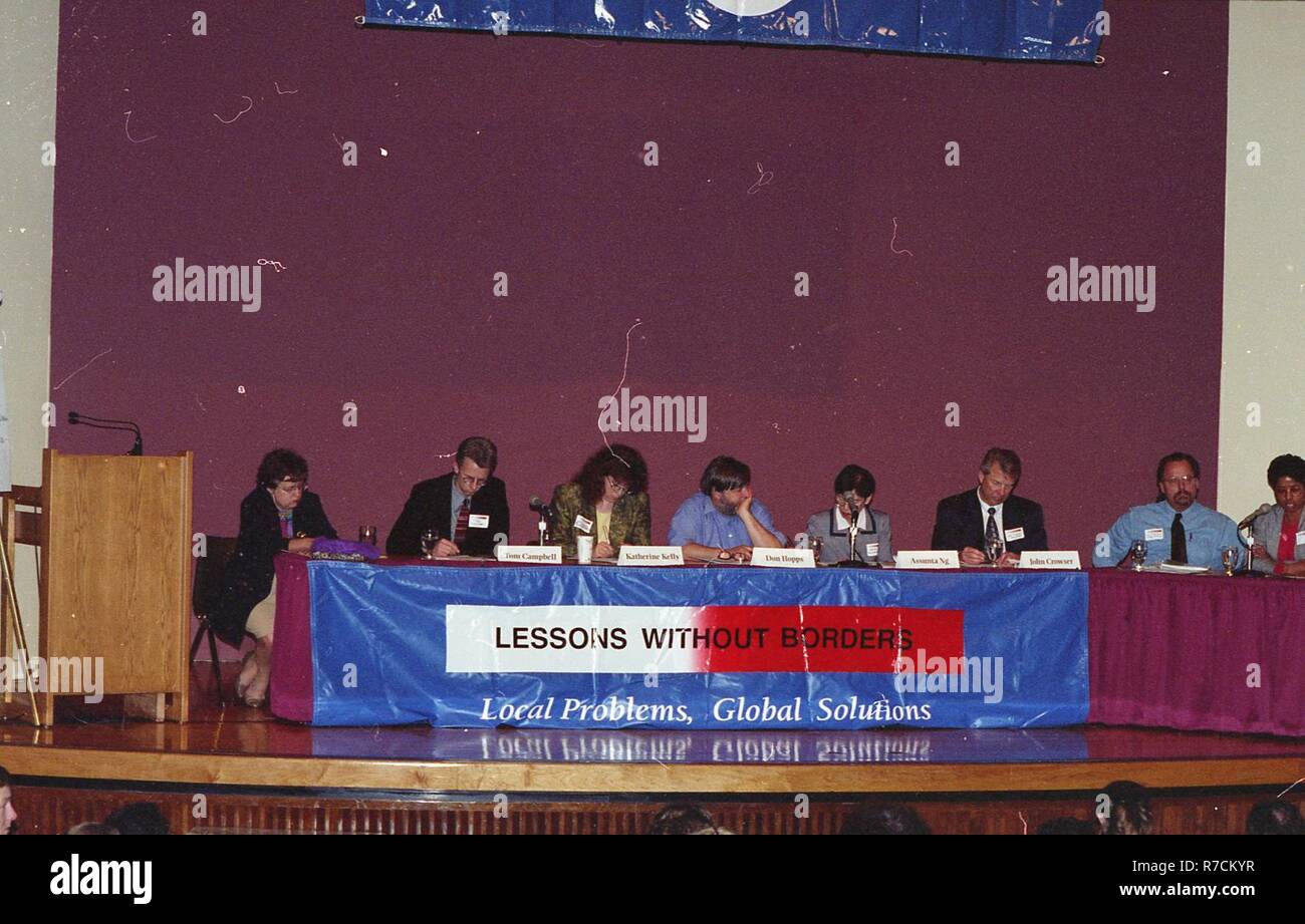 A GROUP OF MEN AND WOMEN ON STAGE AT THE LESSONS WITHOUT BORDERS Stock ...