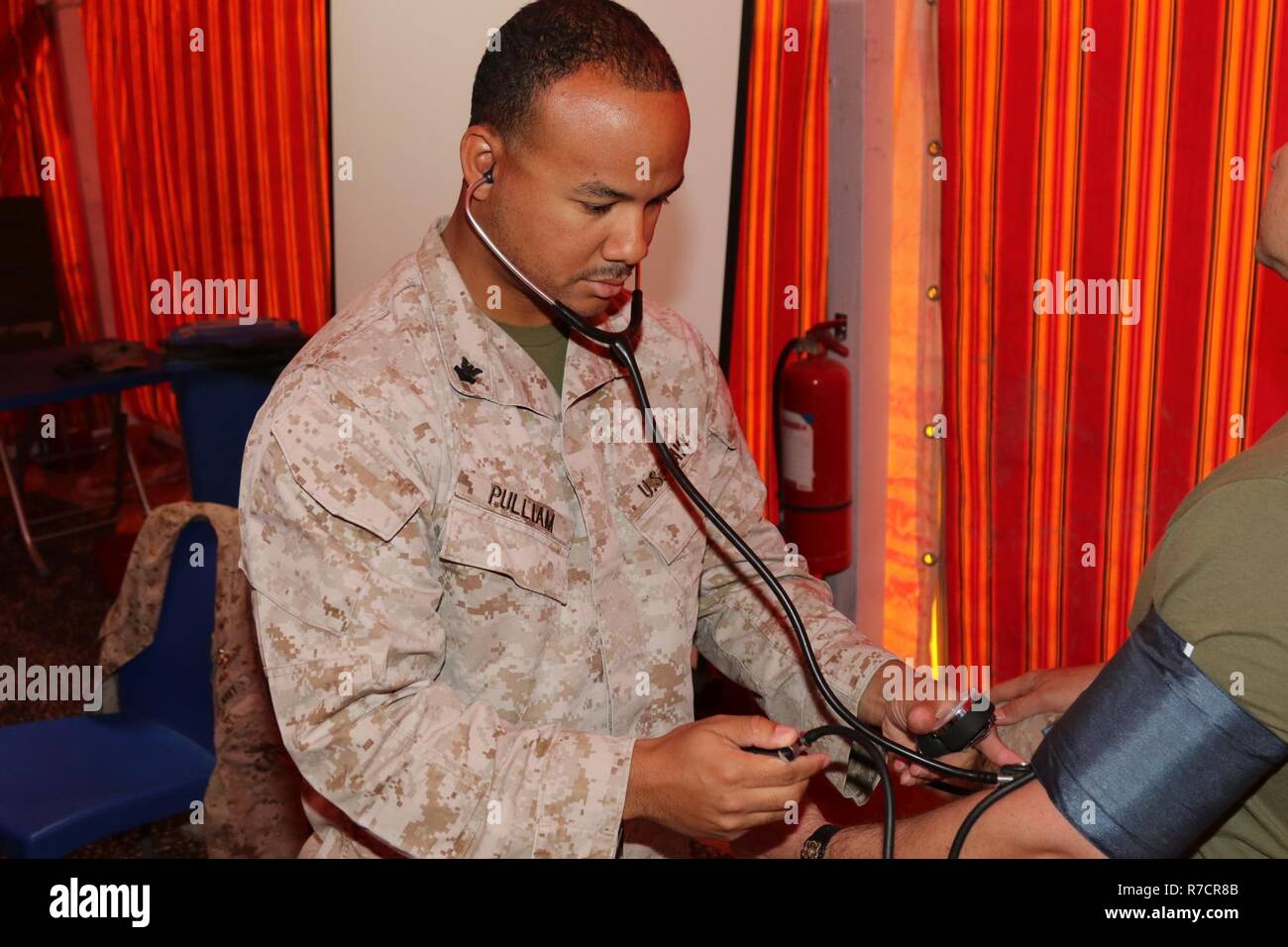 Petty Officer 2nd Class Jermaine Pulliam, with the 1st Medical ...