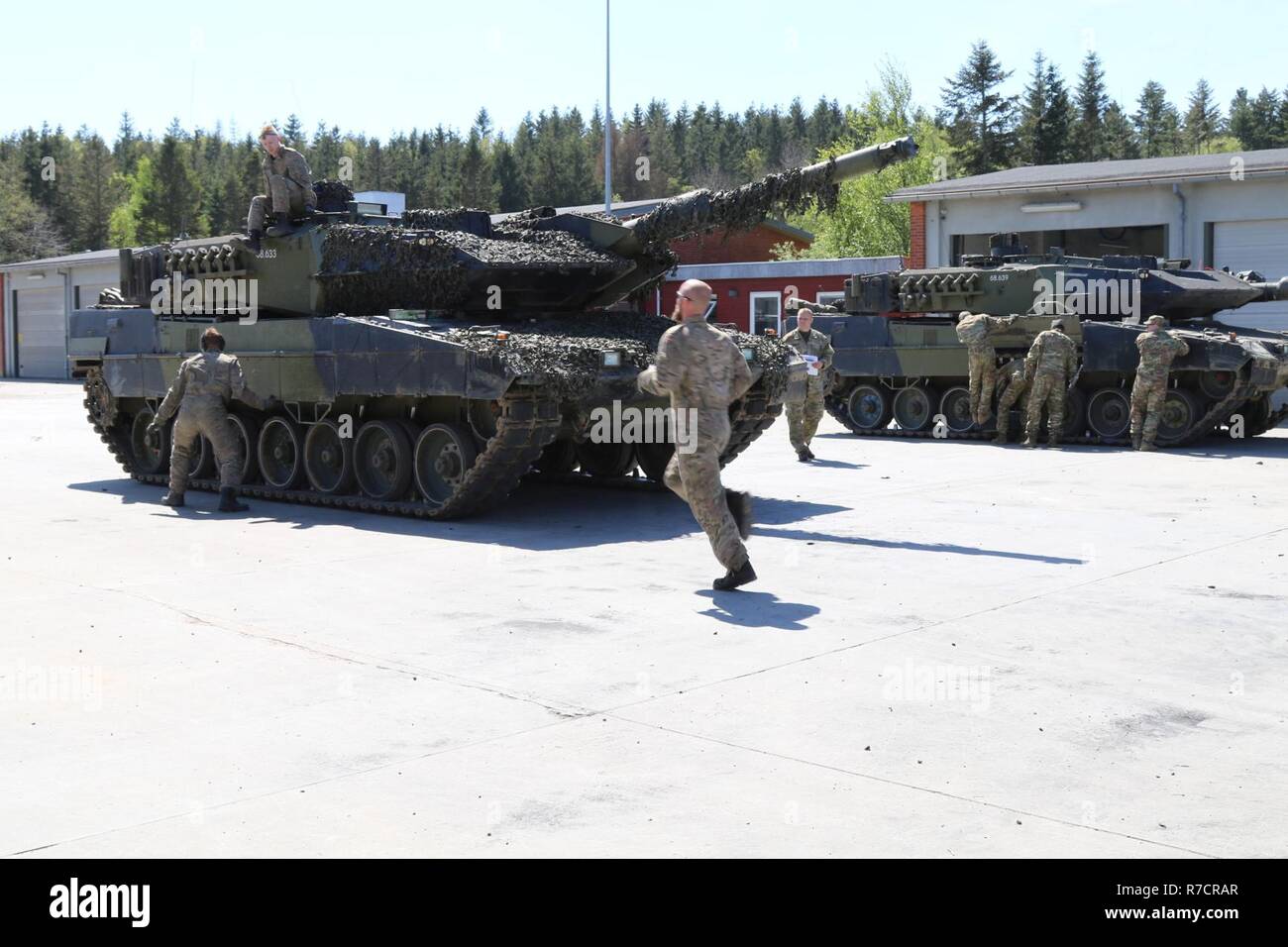 M1A2 Abrams tank crews from Battle Company, 1st Battalion, 66th Armor ...
