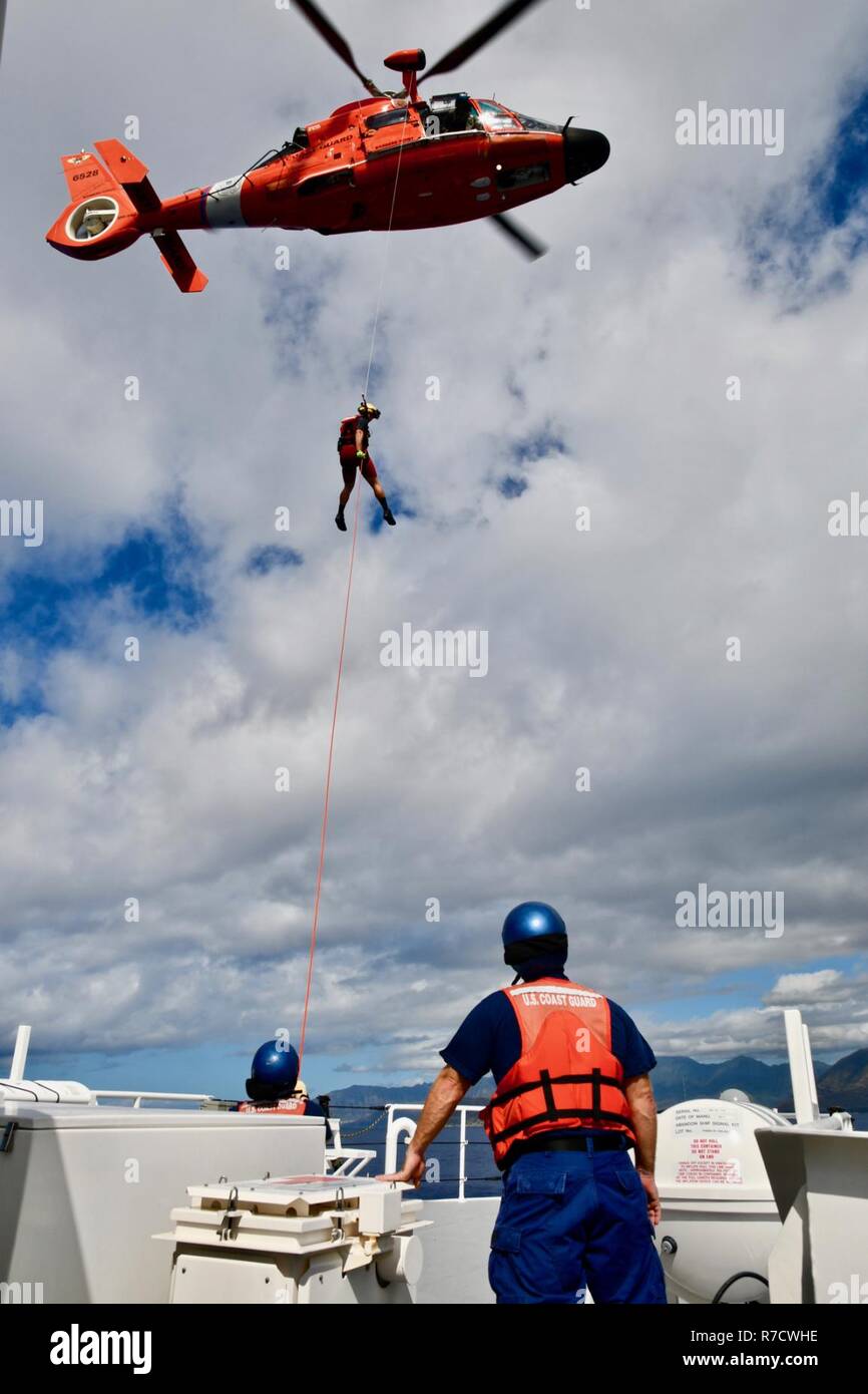 The crew of the Coast Guard Cutter Joseph Gerczak (WPC 1126) receive ...