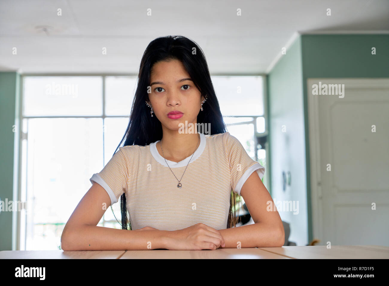 Beautiful woman posing - serious woman Stock Photo - Alamy