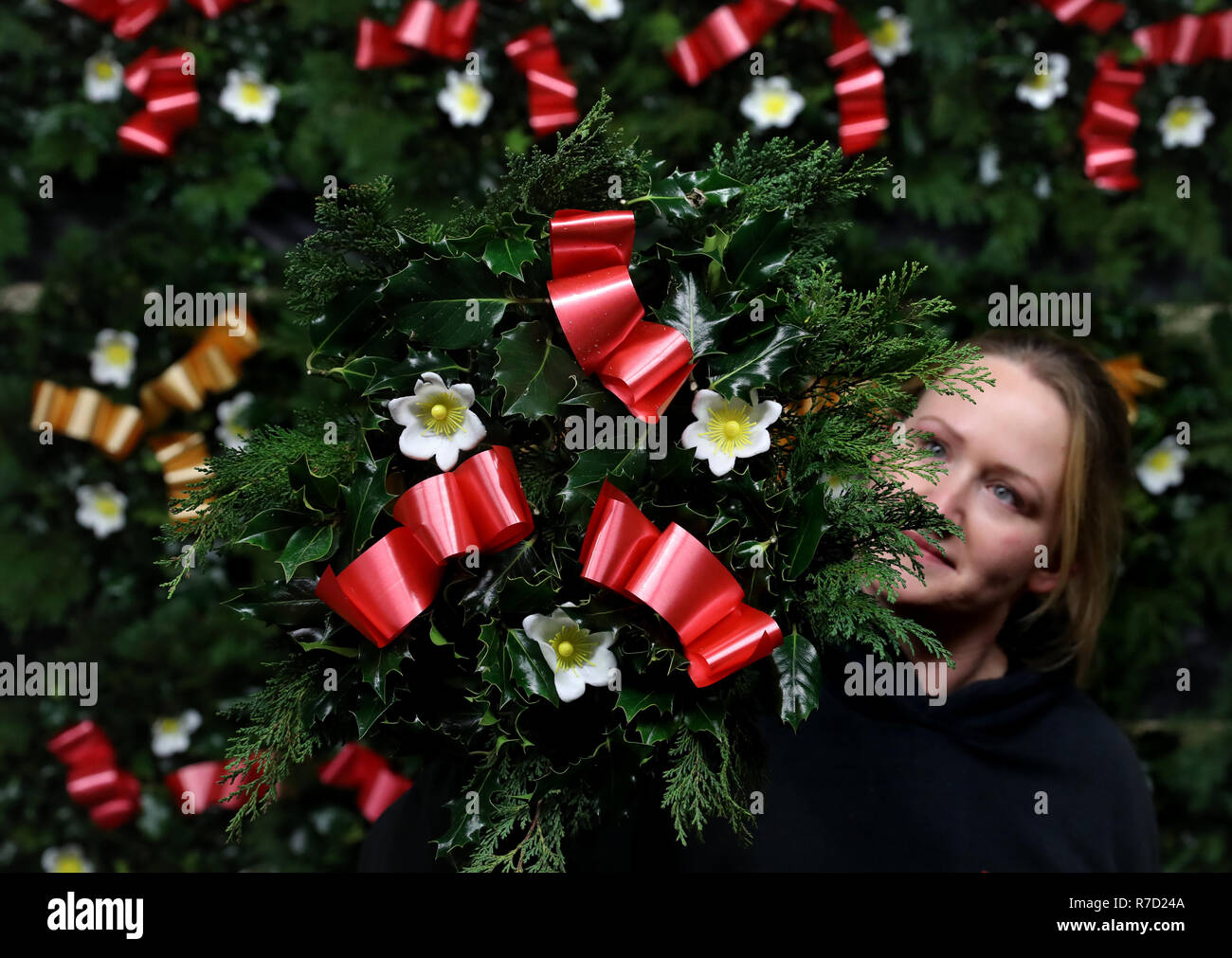Alice Graham puts Christmas wreaths on display at the Smiddy Farm Shop ...